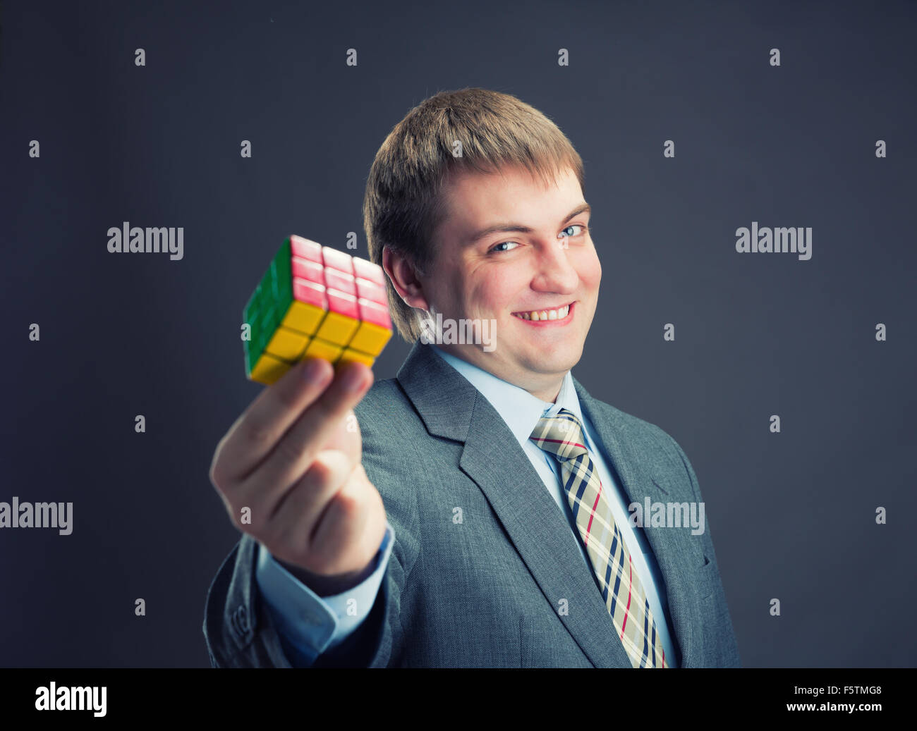 Adult with rubik cube hi-res stock photography and images - Alamy