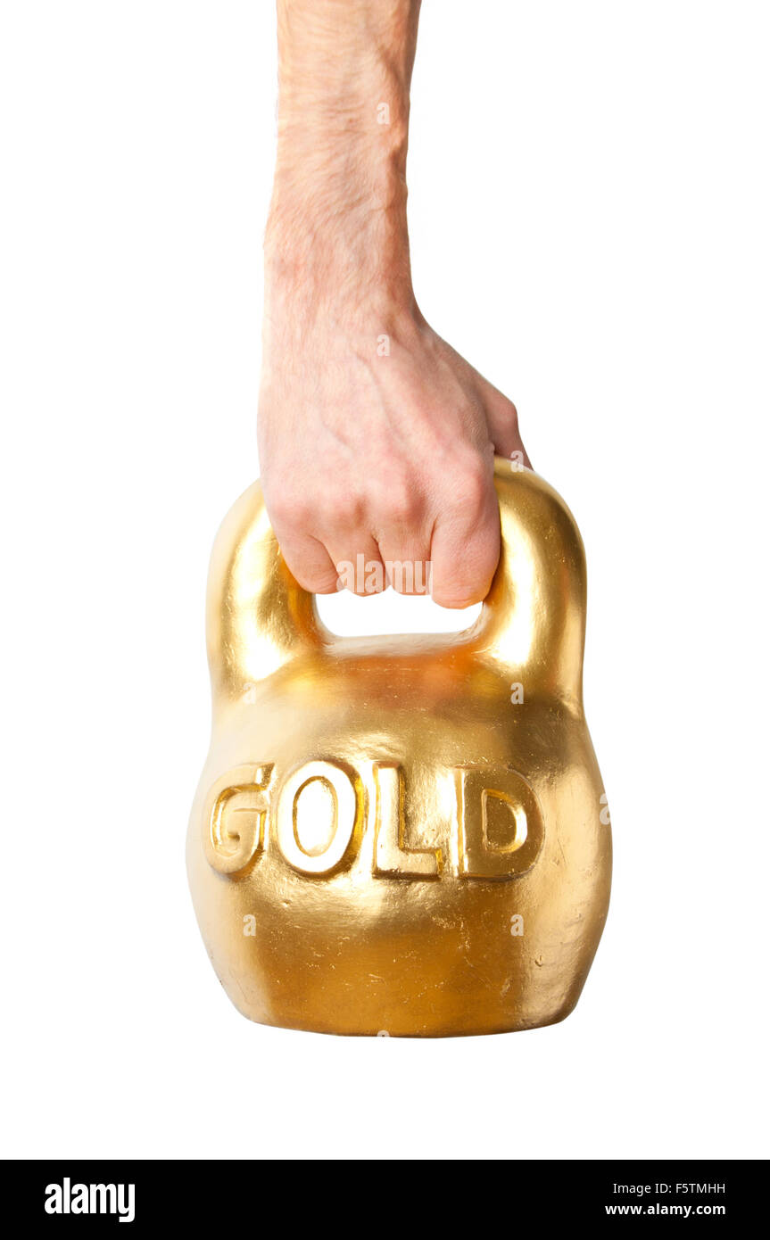 A hand holding heavy weight of gold. Isolated on white Stock Photo - Alamy