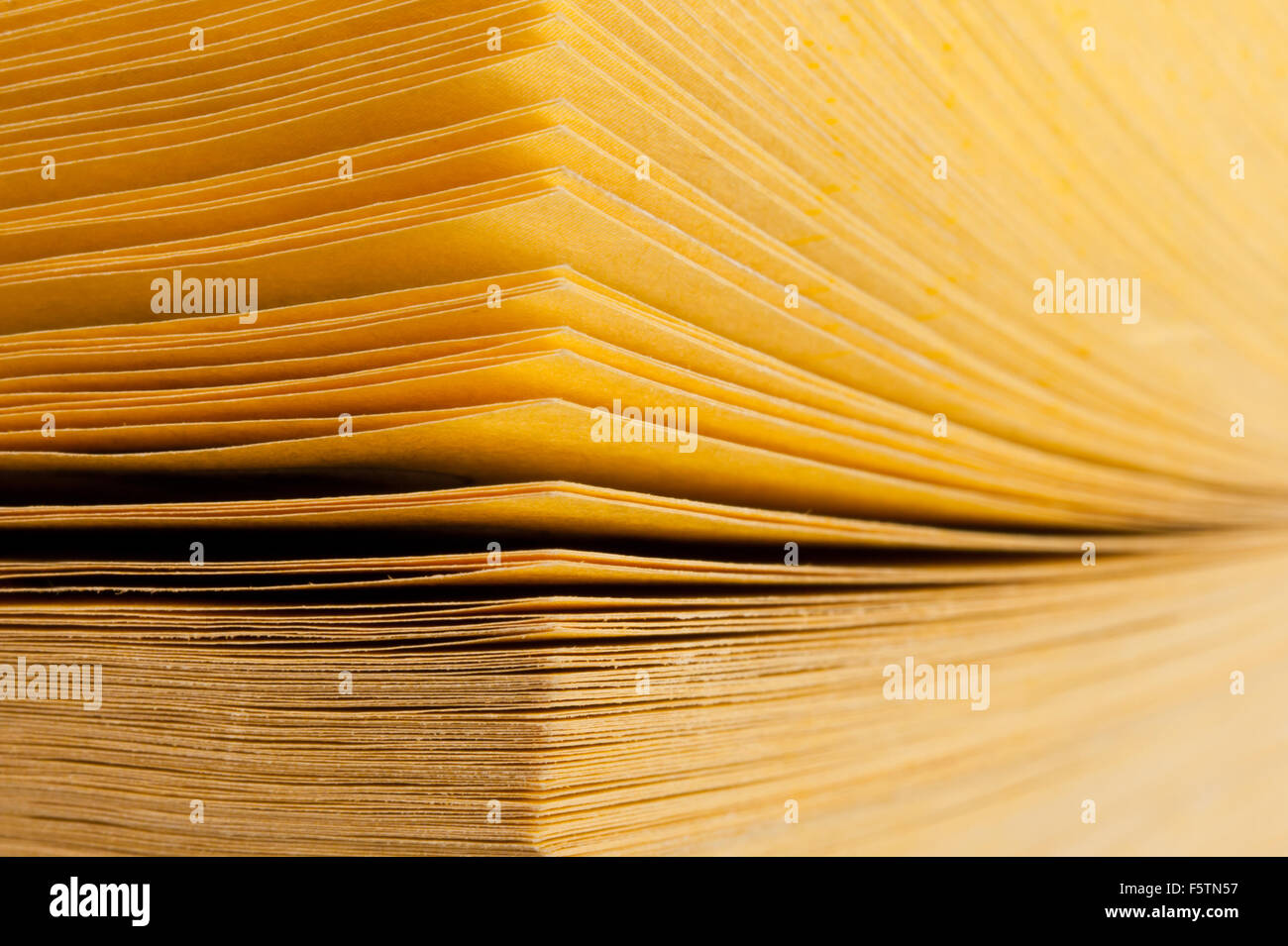 Close-up abstract view of yellow pages book Stock Photo - Alamy