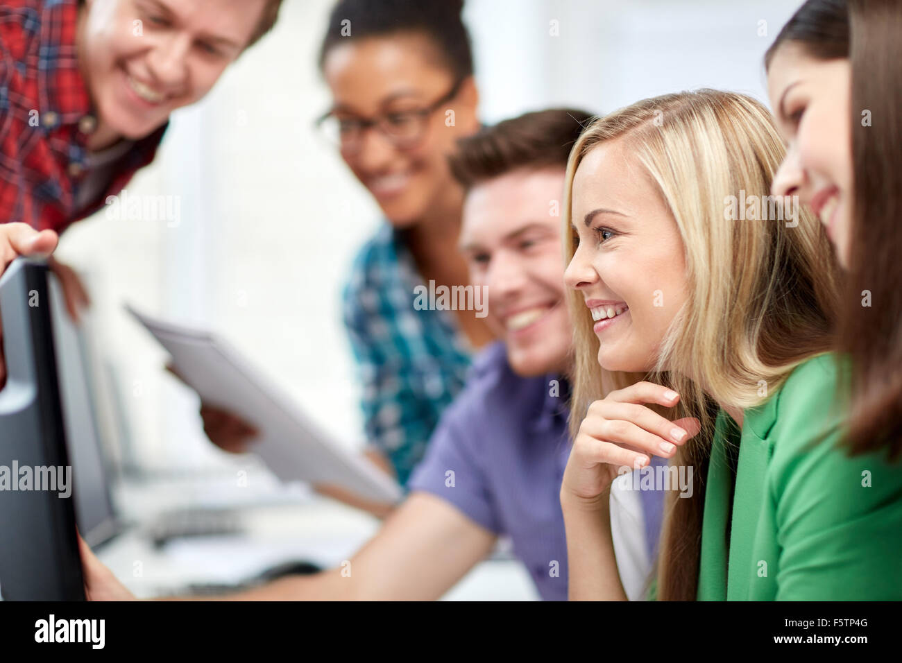 happy high school students in computer class Stock Photo - Alamy