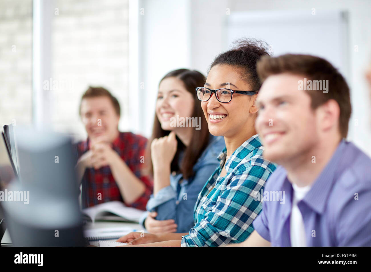 happy high school students in computer class Stock Photo - Alamy