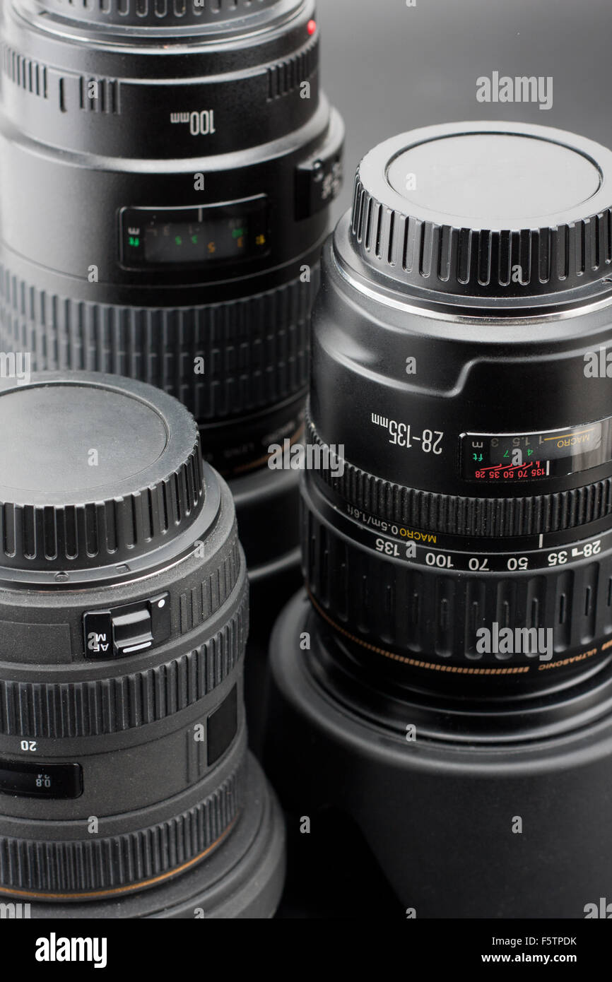 Close-up of three different professional camera lenses Stock Photo - Alamy