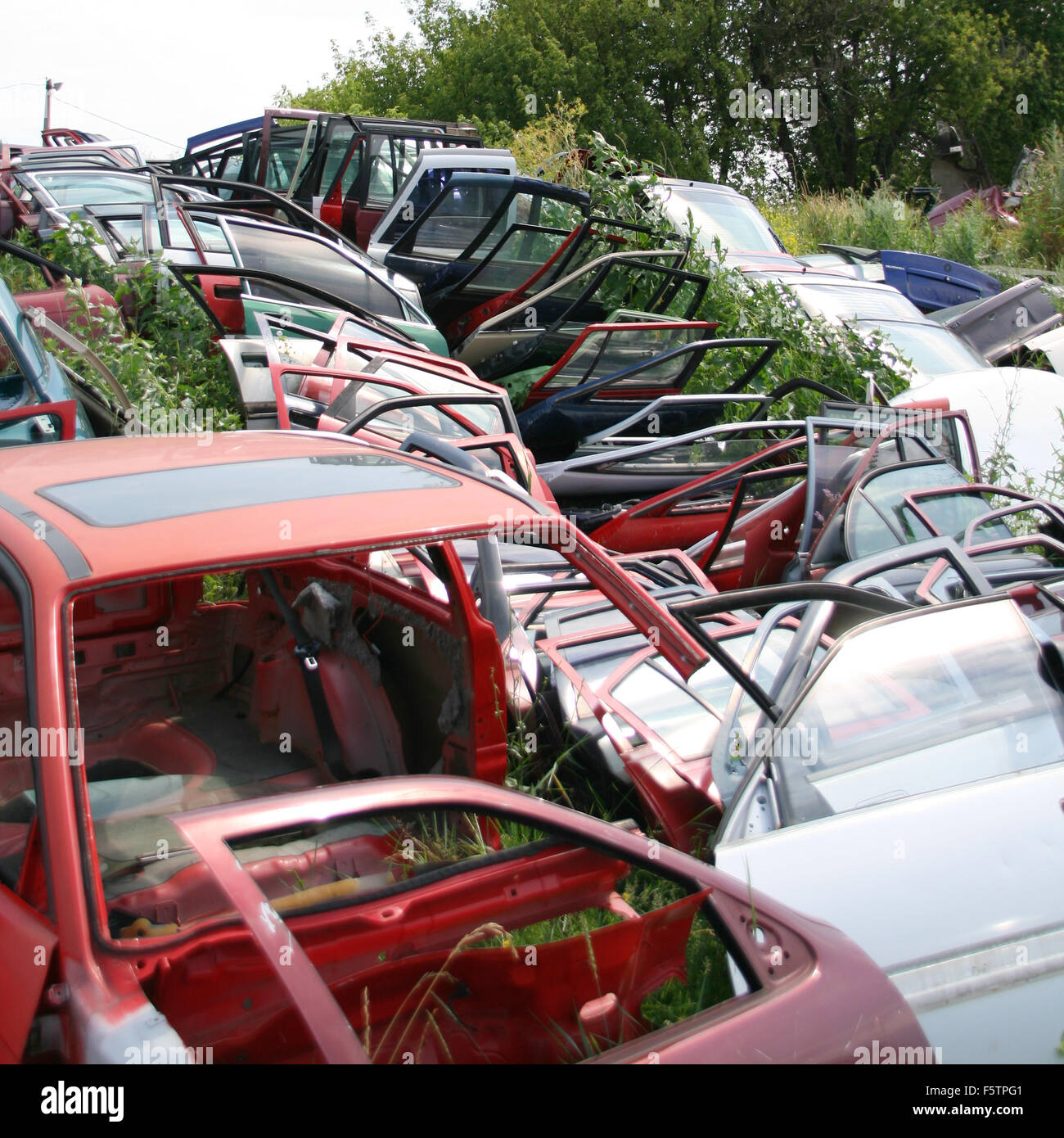 Big heap of car doors Stock Photo - Alamy