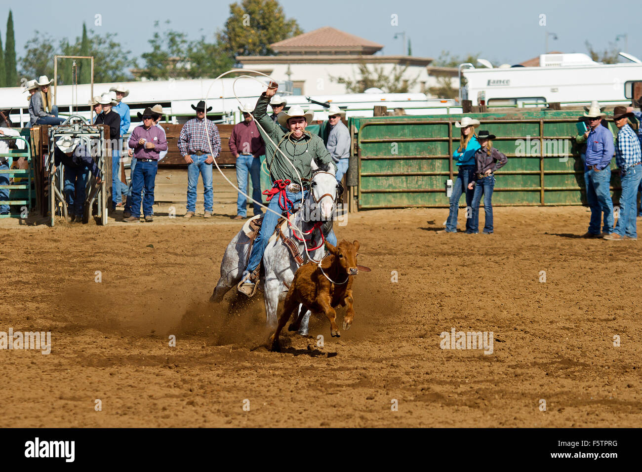 Young women compete in barrel racing at the Lincoln, California Rodeo ...