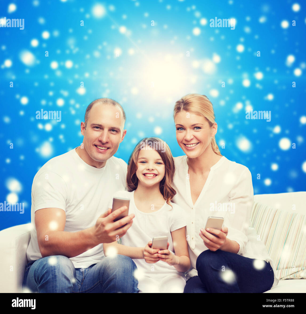 happy family with smartphones Stock Photo - Alamy