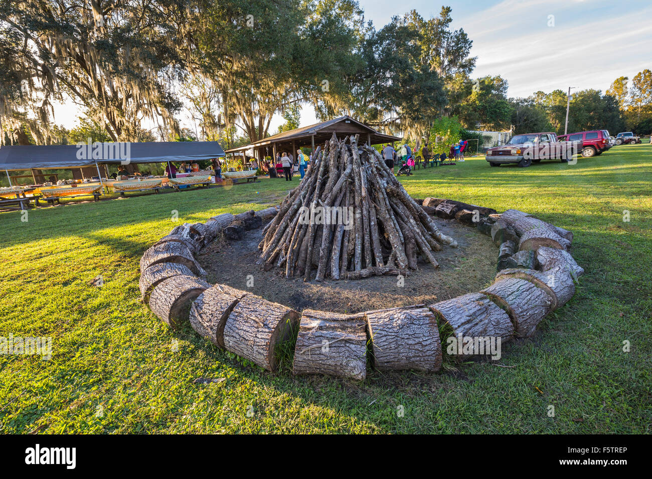 Bonfire ring of firewood ready for action at a fall gathering Stock ...