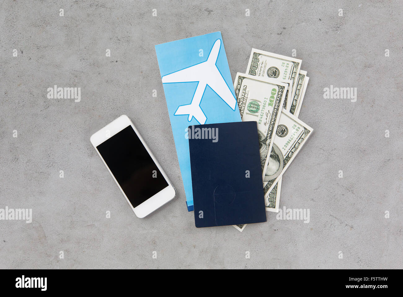 air ticket, money, smartphone and passport Stock Photo - Alamy