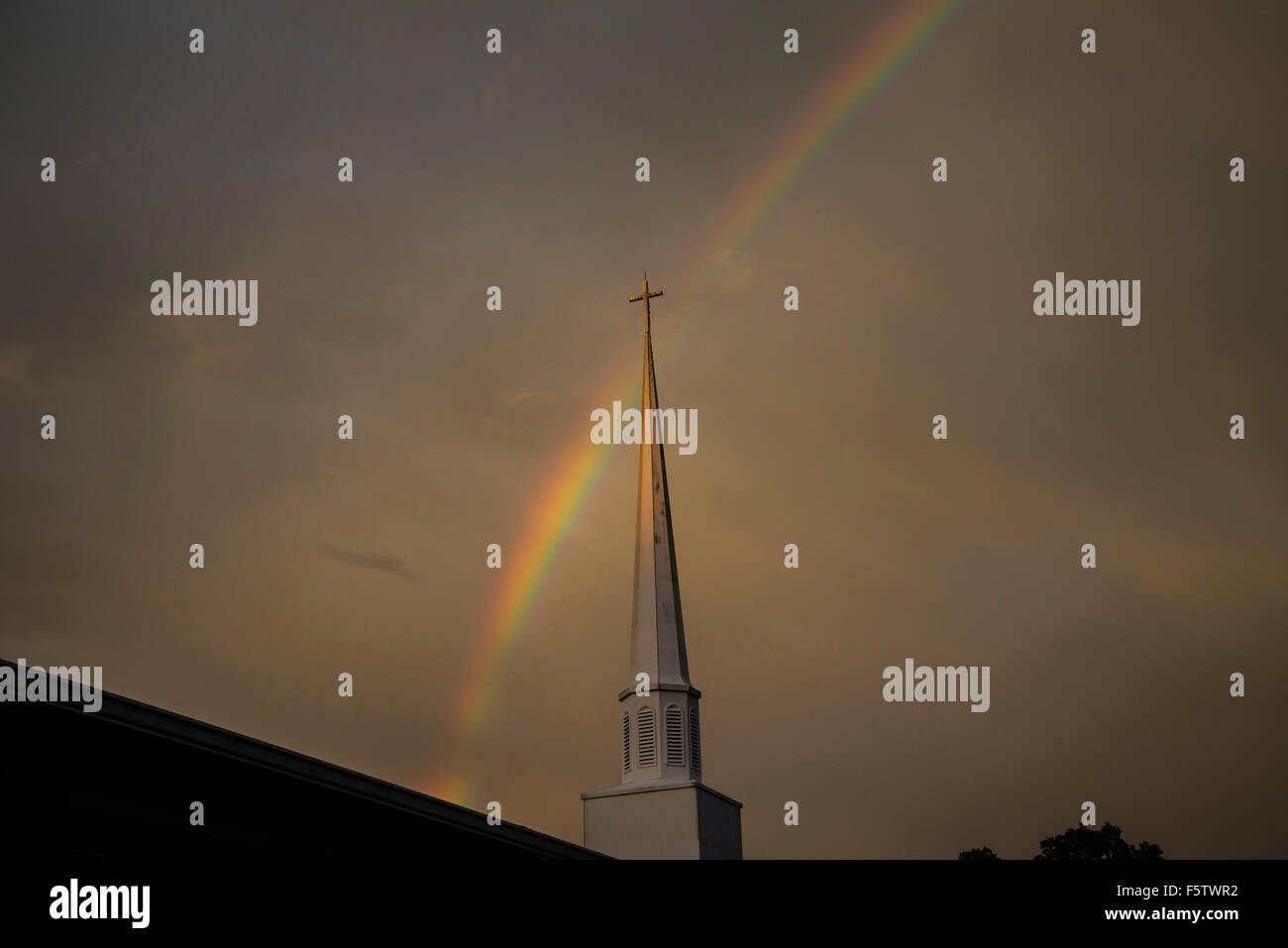 Rainbow over church hi-res stock photography and images - Alamy