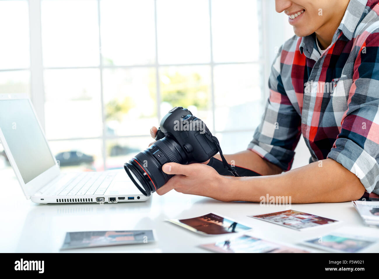 Male photographer using graphics tablet hi-res stock photography and ...