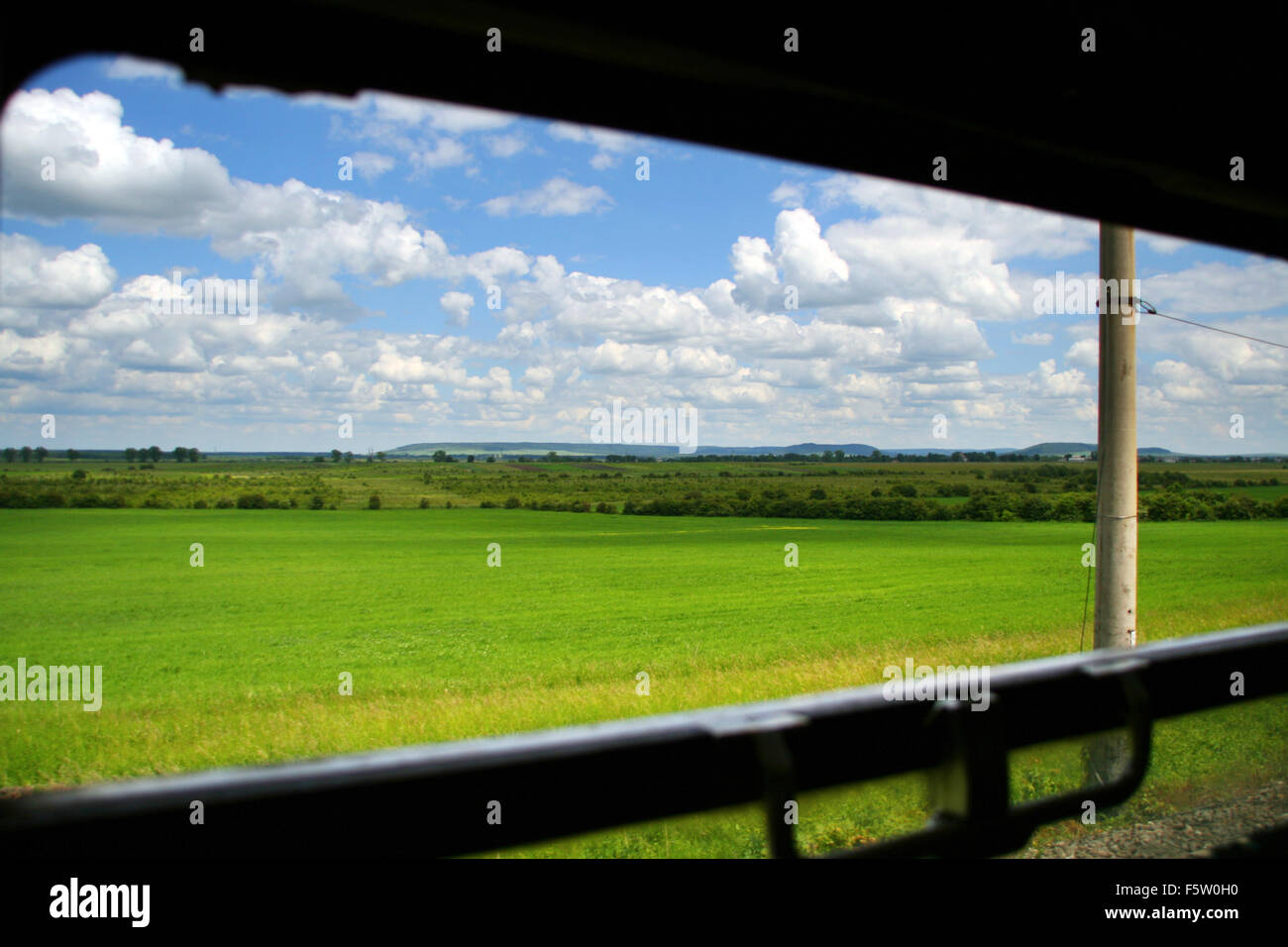 Open train window into idyllic landscape Stock Photo - Alamy