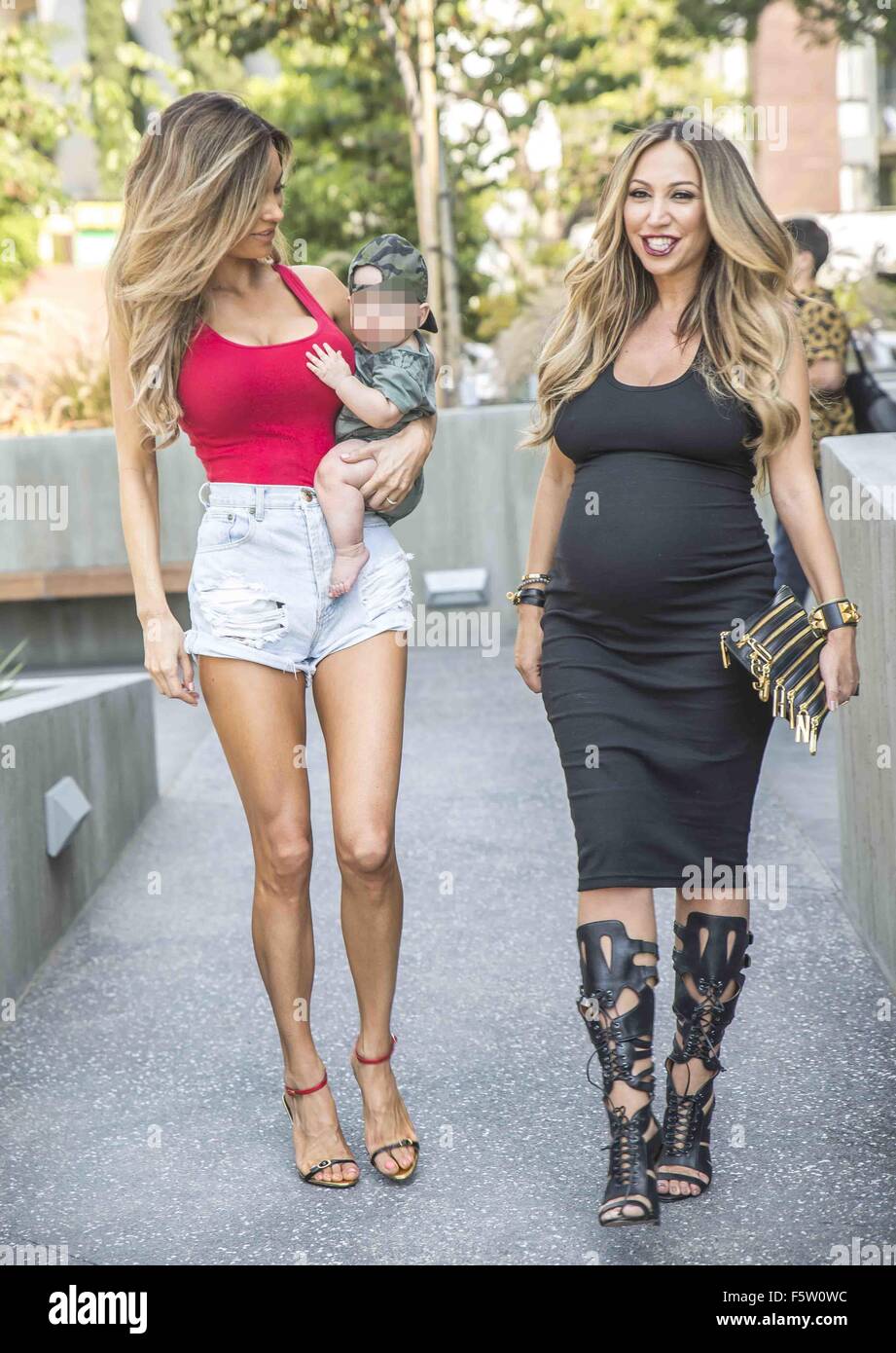 Model Sarah Stage with her baby son James are seen with Diana Madison ...