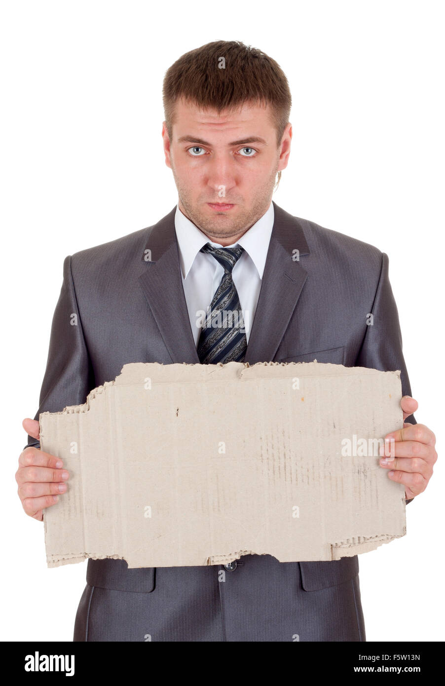 Sad businessman with messy cardboard frame. Isolated on white Stock ...