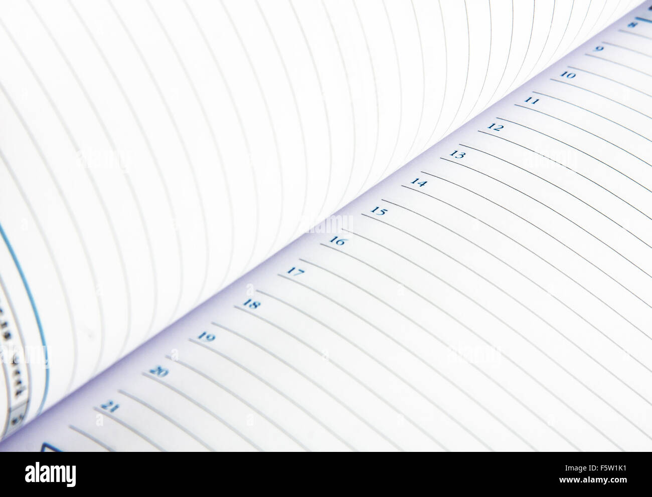 Close-up view of an open business diary Stock Photo - Alamy