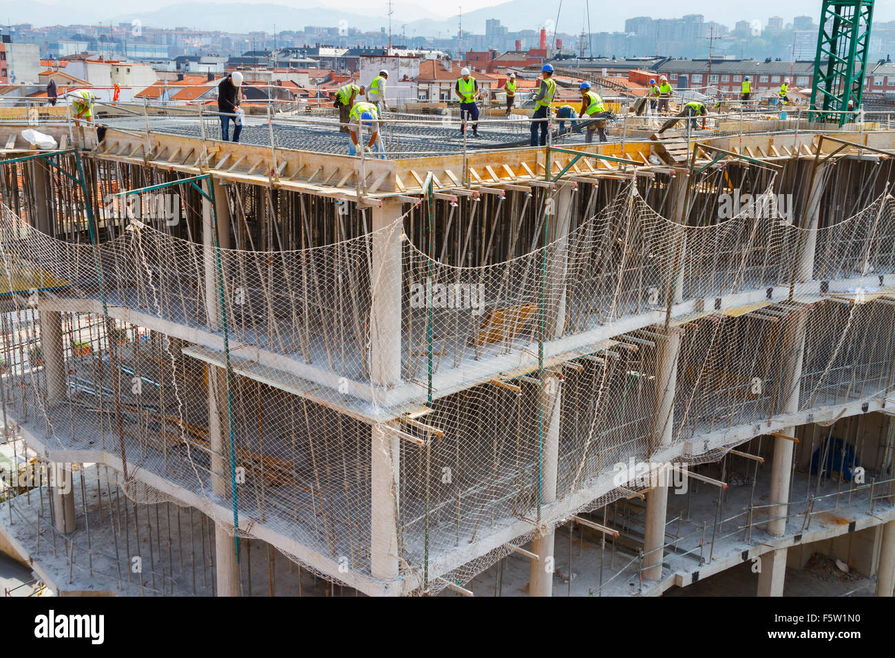Men at building work Stock Photo - Alamy
