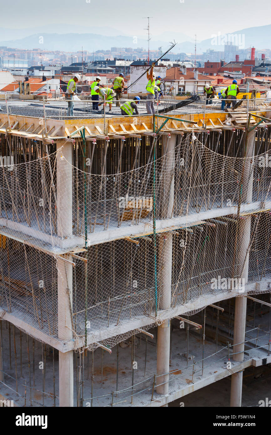 Men at building work Stock Photo - Alamy