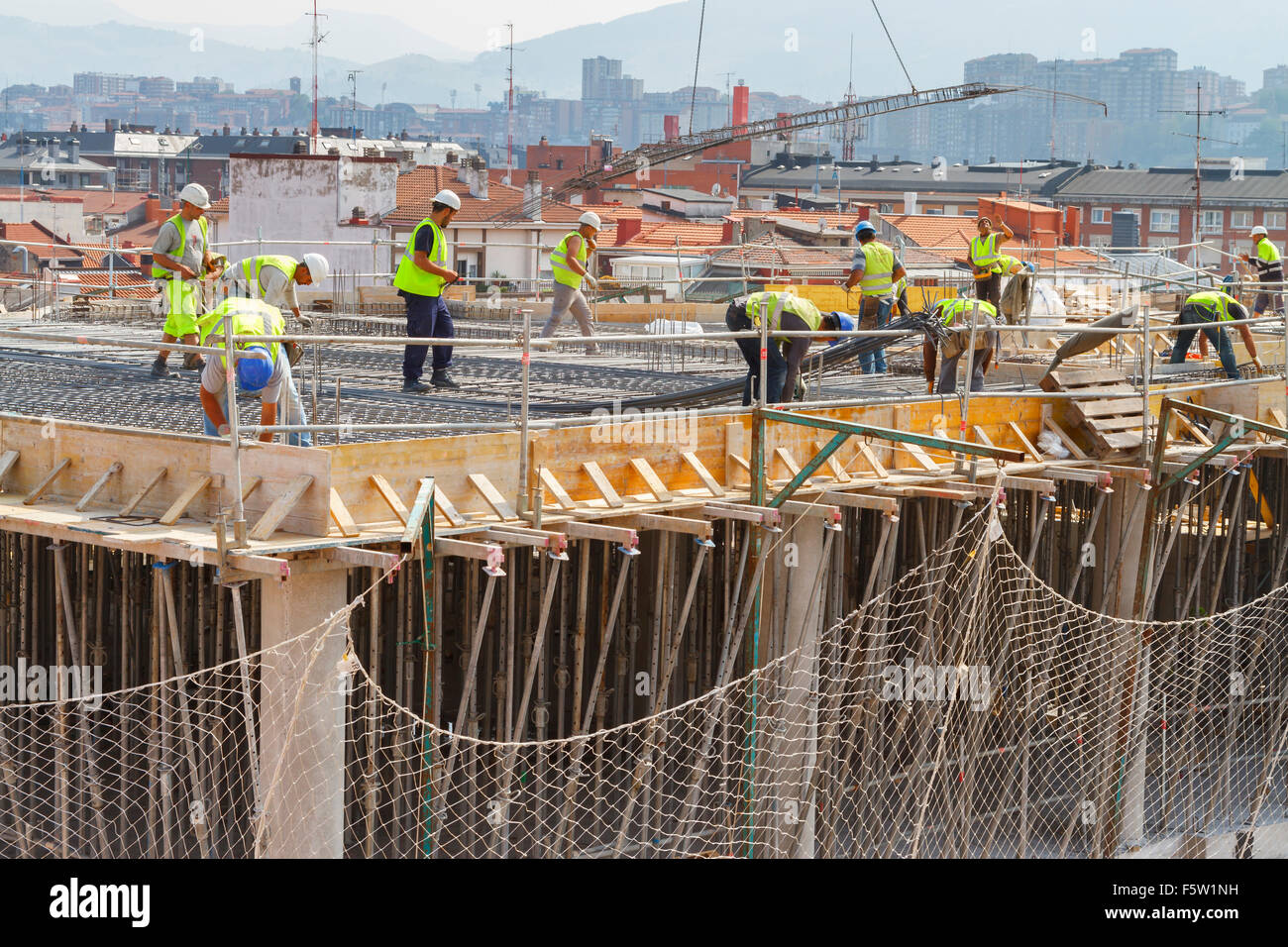 Men at building work Stock Photo - Alamy