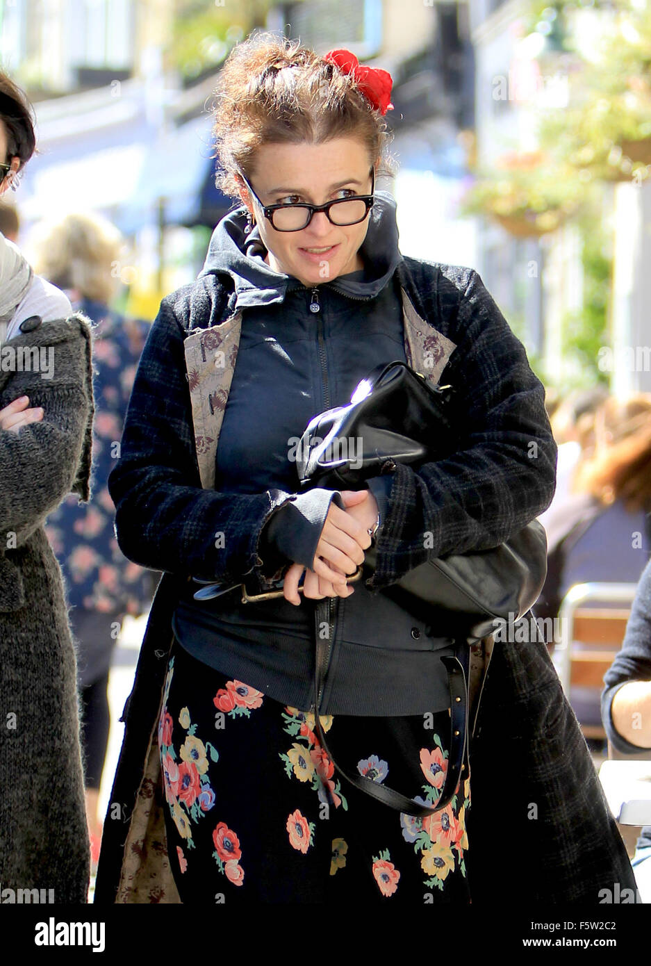 As London enjoys an indian summer, Helena Bonham Carter wears a huge ...