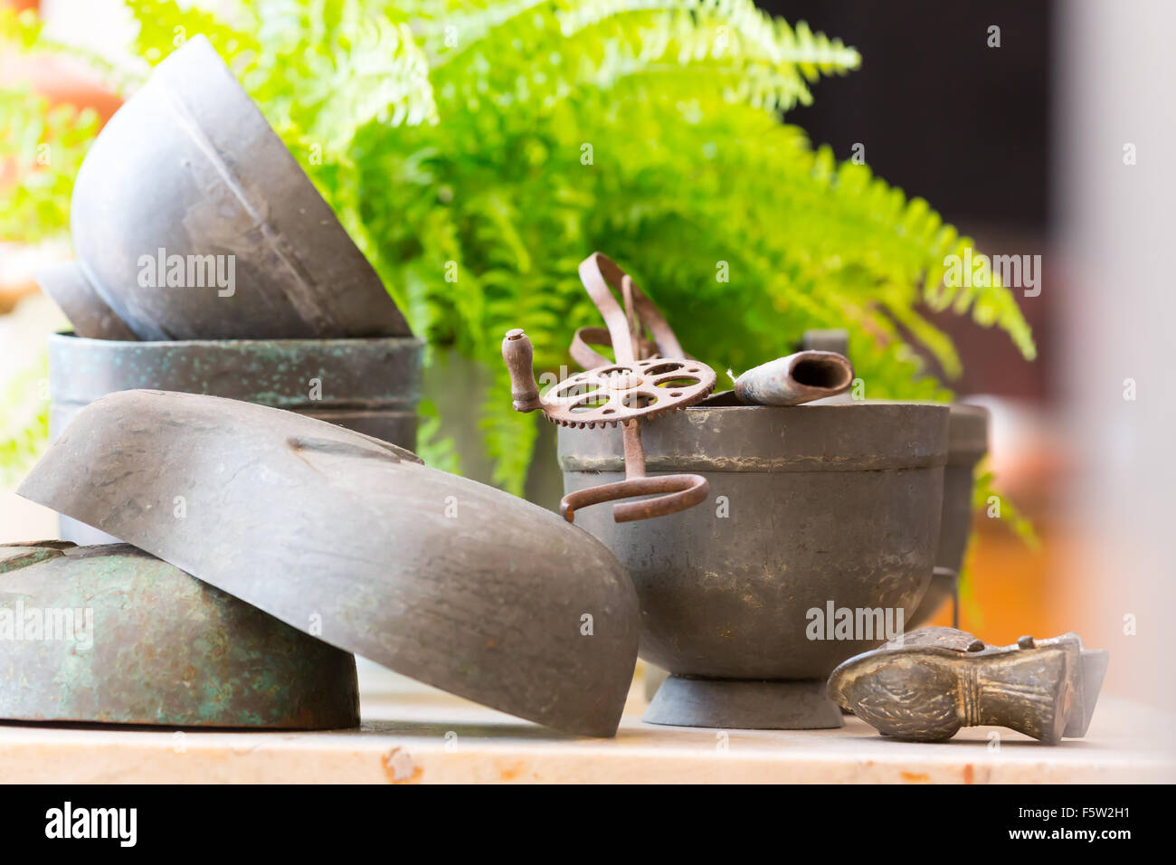 Old pots on the table close up Stock Photo - Alamy