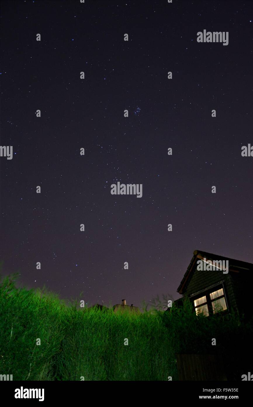 Starry sky above house Stock Photo - Alamy