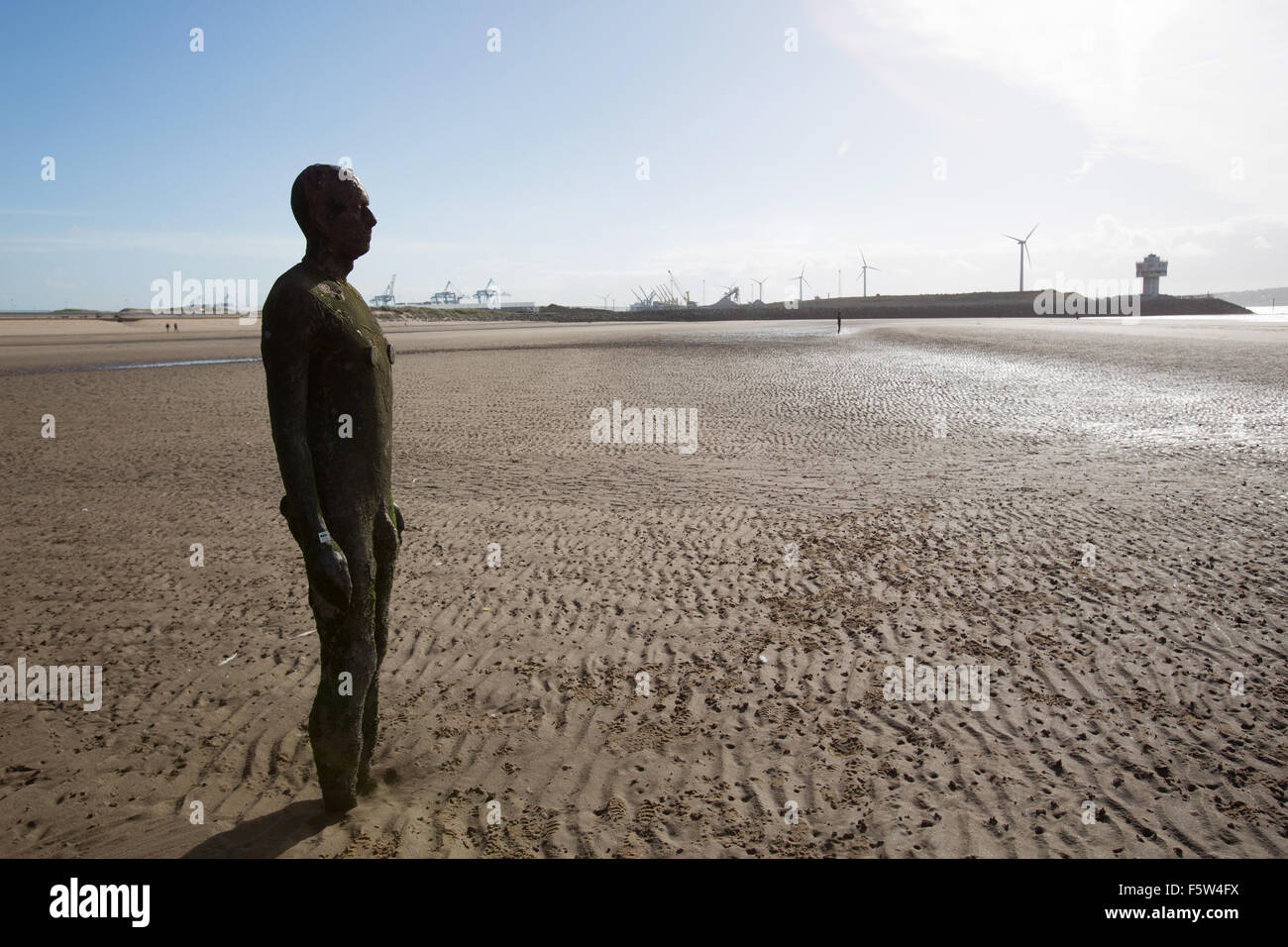 Crosby Beach, England. Picturesque view of the Antony Gormley, Iron Men ...