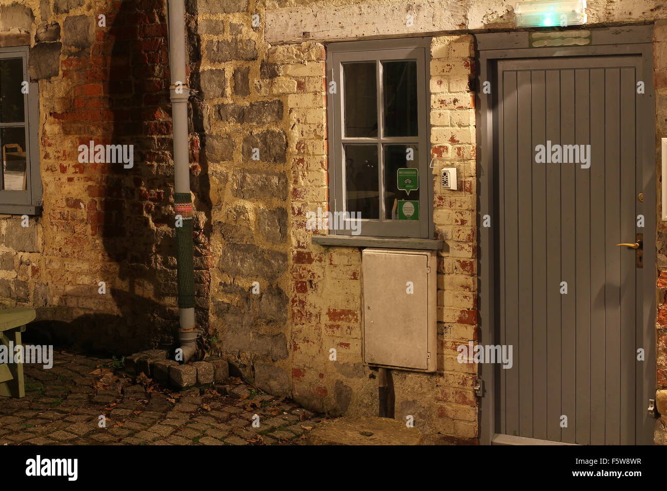 Old back-door and window at night Stock Photo - Alamy