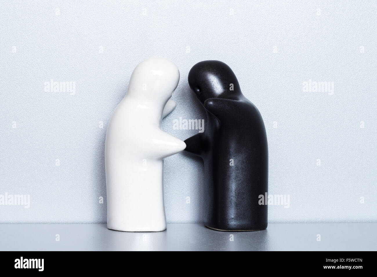 Two ceramic figures Stock Photo - Alamy
