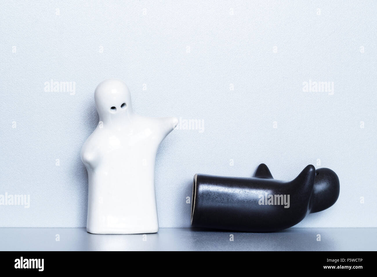 Two ceramic figures Stock Photo - Alamy