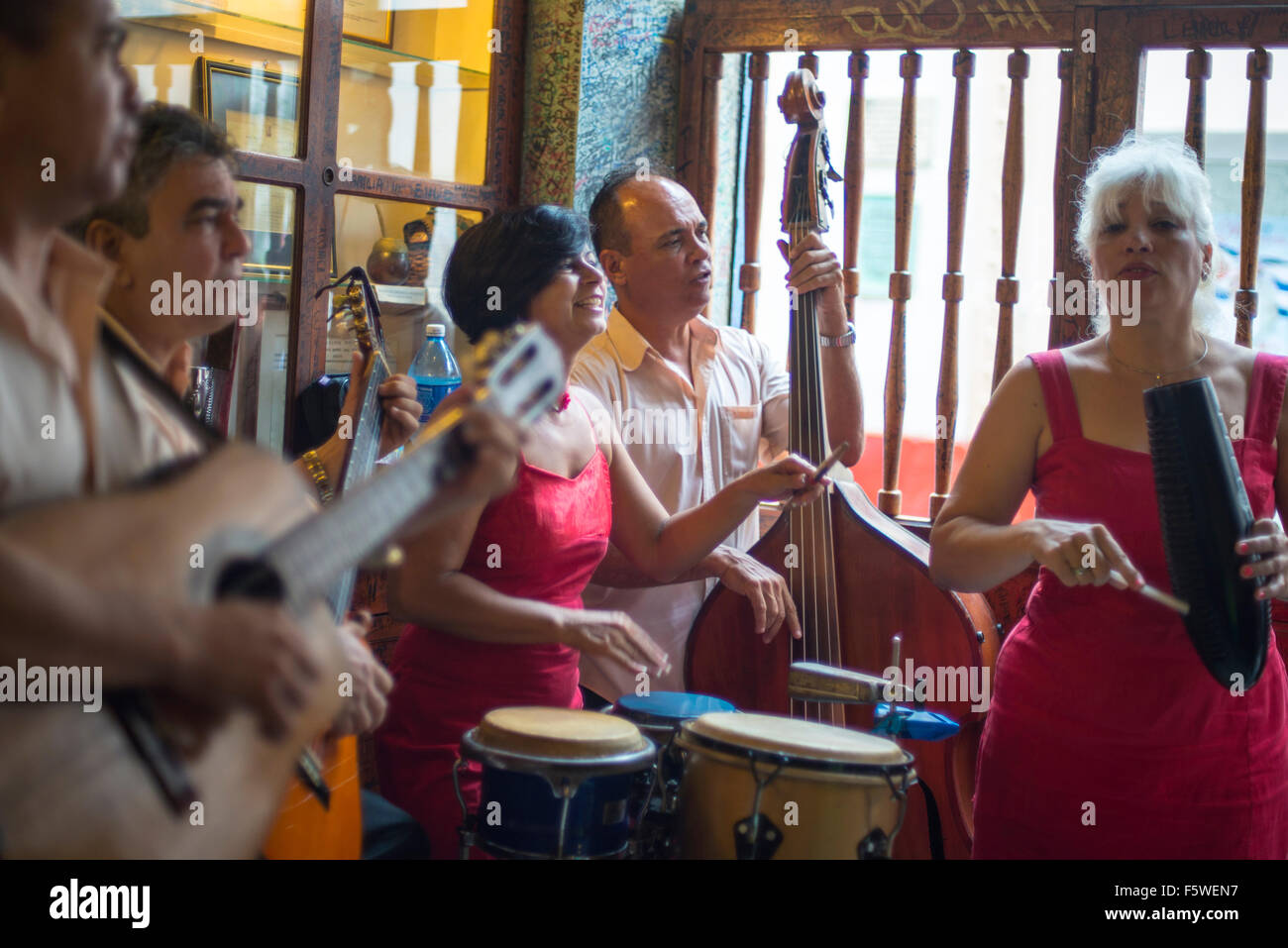A mixed group of five musicians play for guests in Havana, Cuba Stock ...