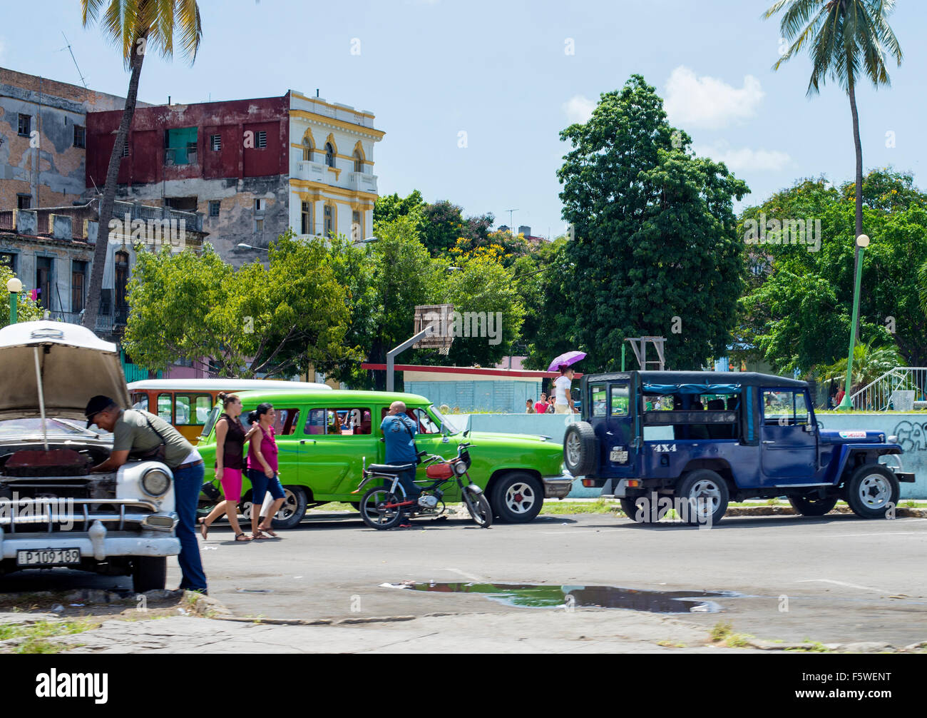 Bright neon green car stuck in traffic in Havana, Cuba Stock Photo - Alamy