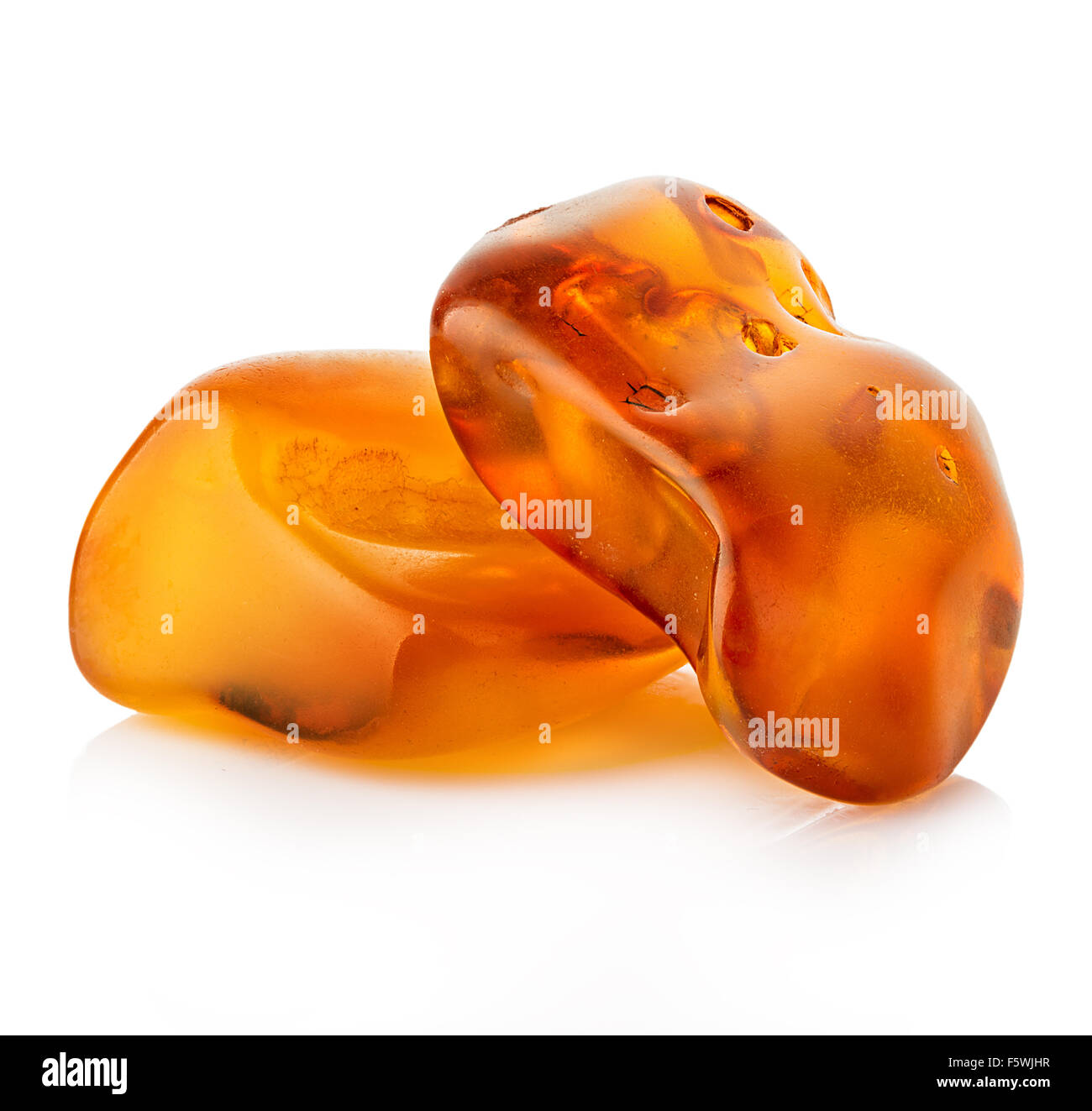 pieces of amber close-up isolated on a white background Stock Photo - Alamy