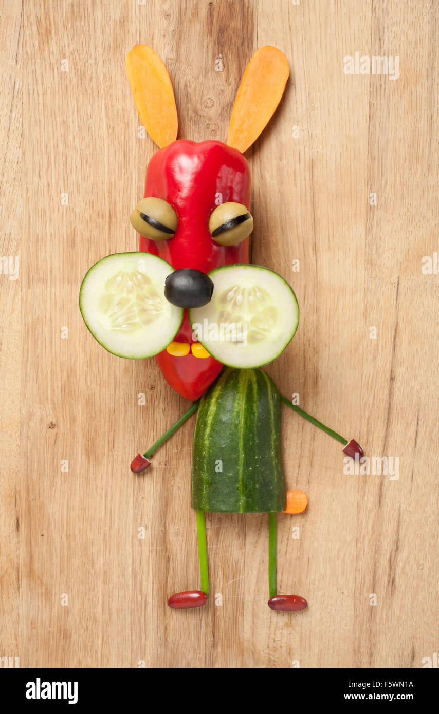 Vegetable rabbit on wooden background Stock Photo - Alamy