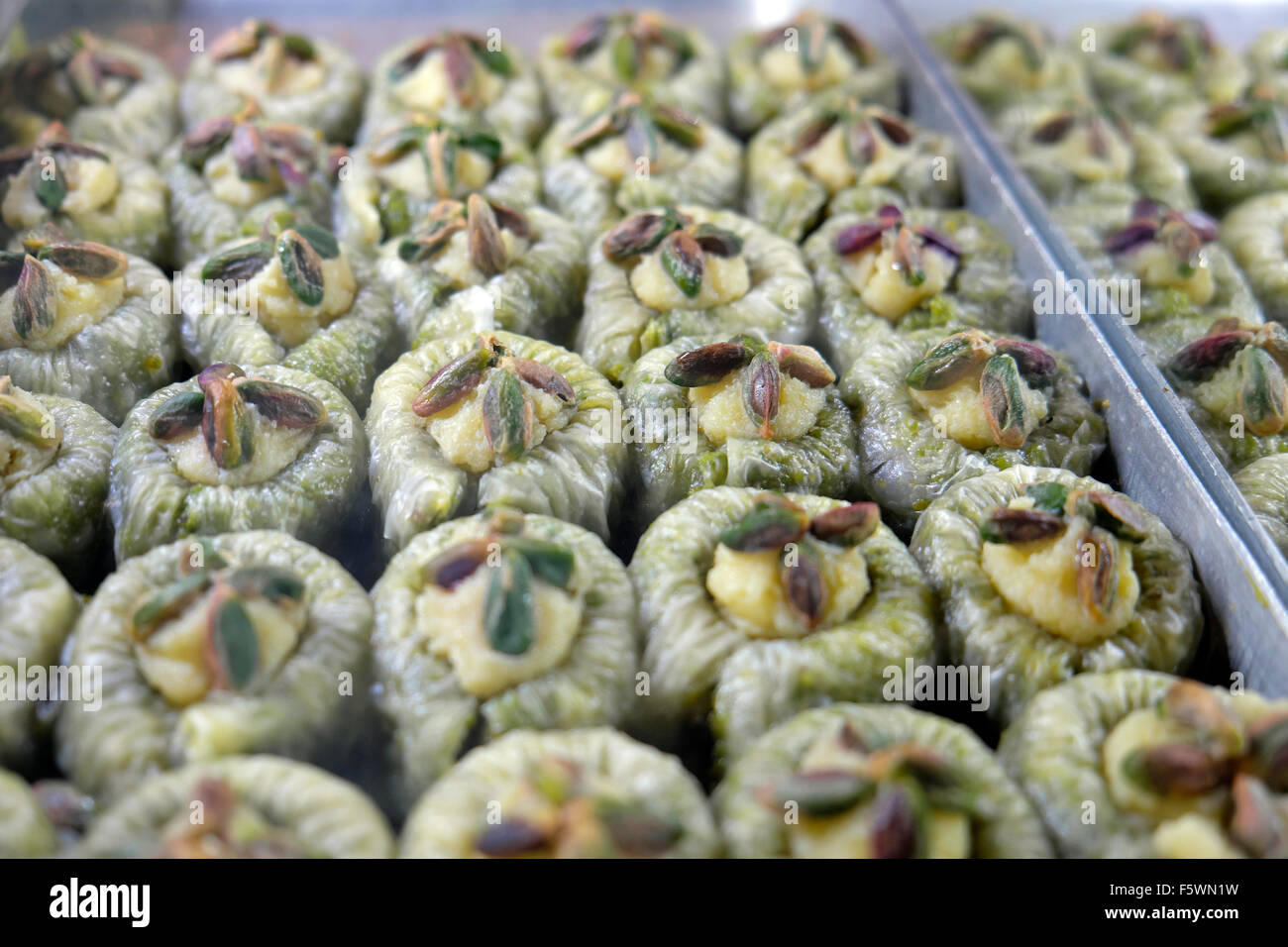 Fig & almond sweet display on counter at Petek Confectioner shop and ...