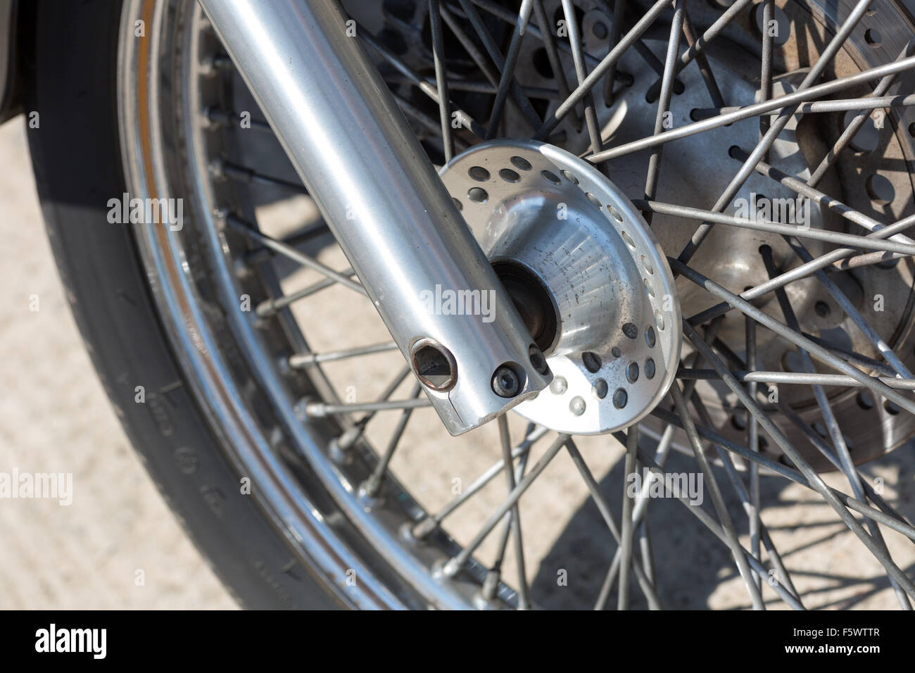 Detail of the front wheel of a motorcycle with spokes Stock Photo - Alamy