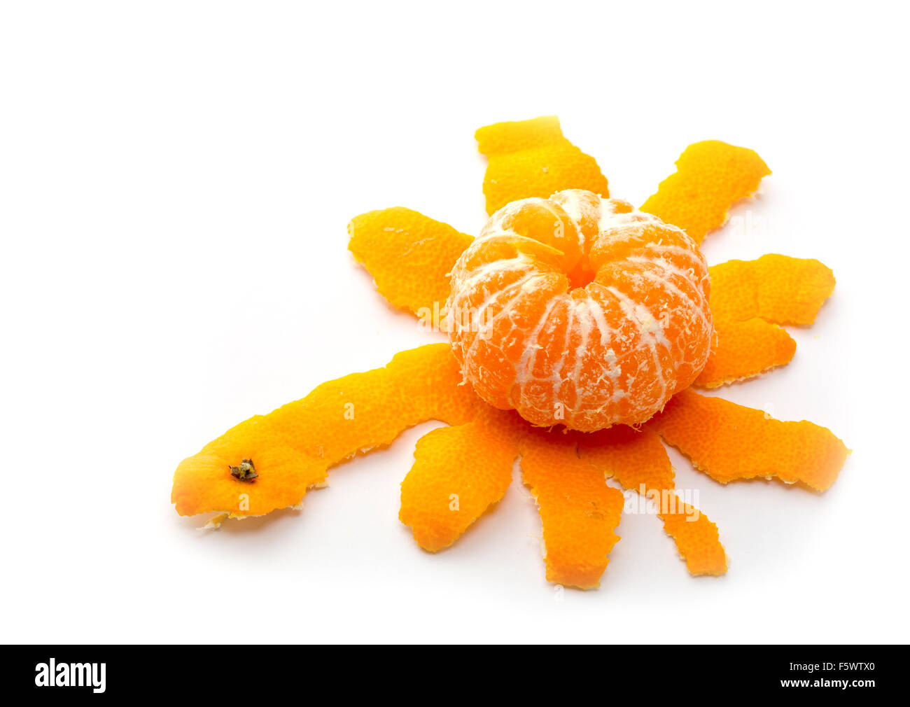 A peeled tangerine isolated on white background Stock Photo - Alamy
