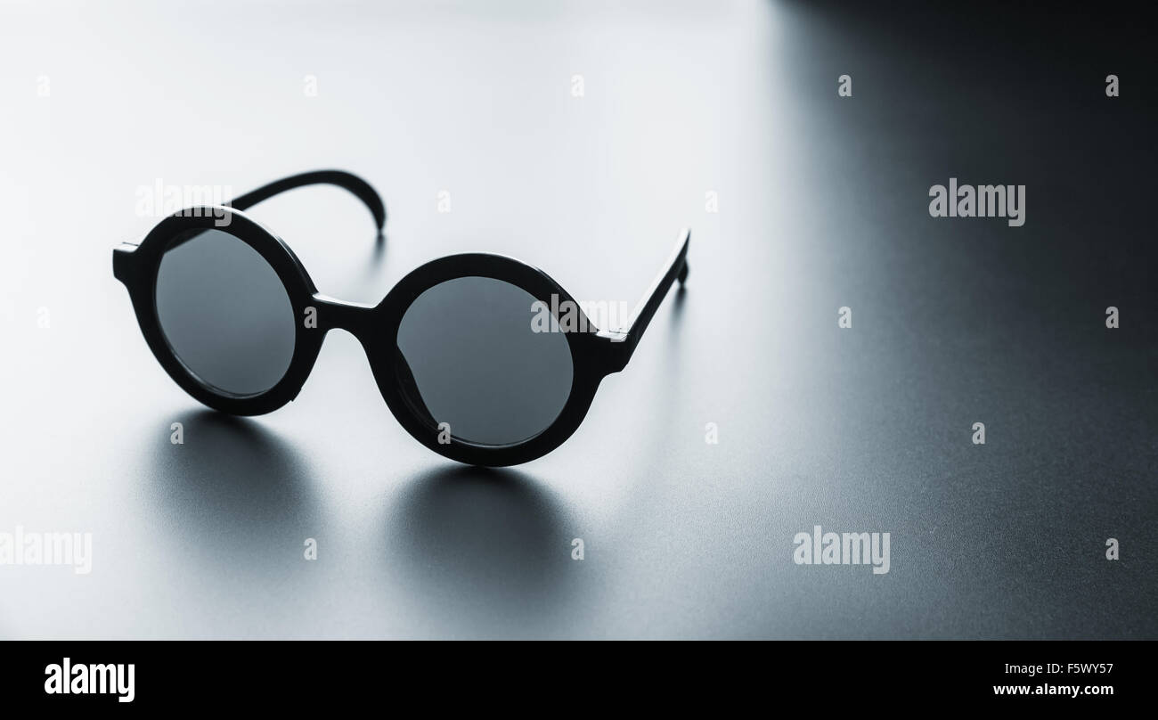 A pair of black round glasses Stock Photo - Alamy