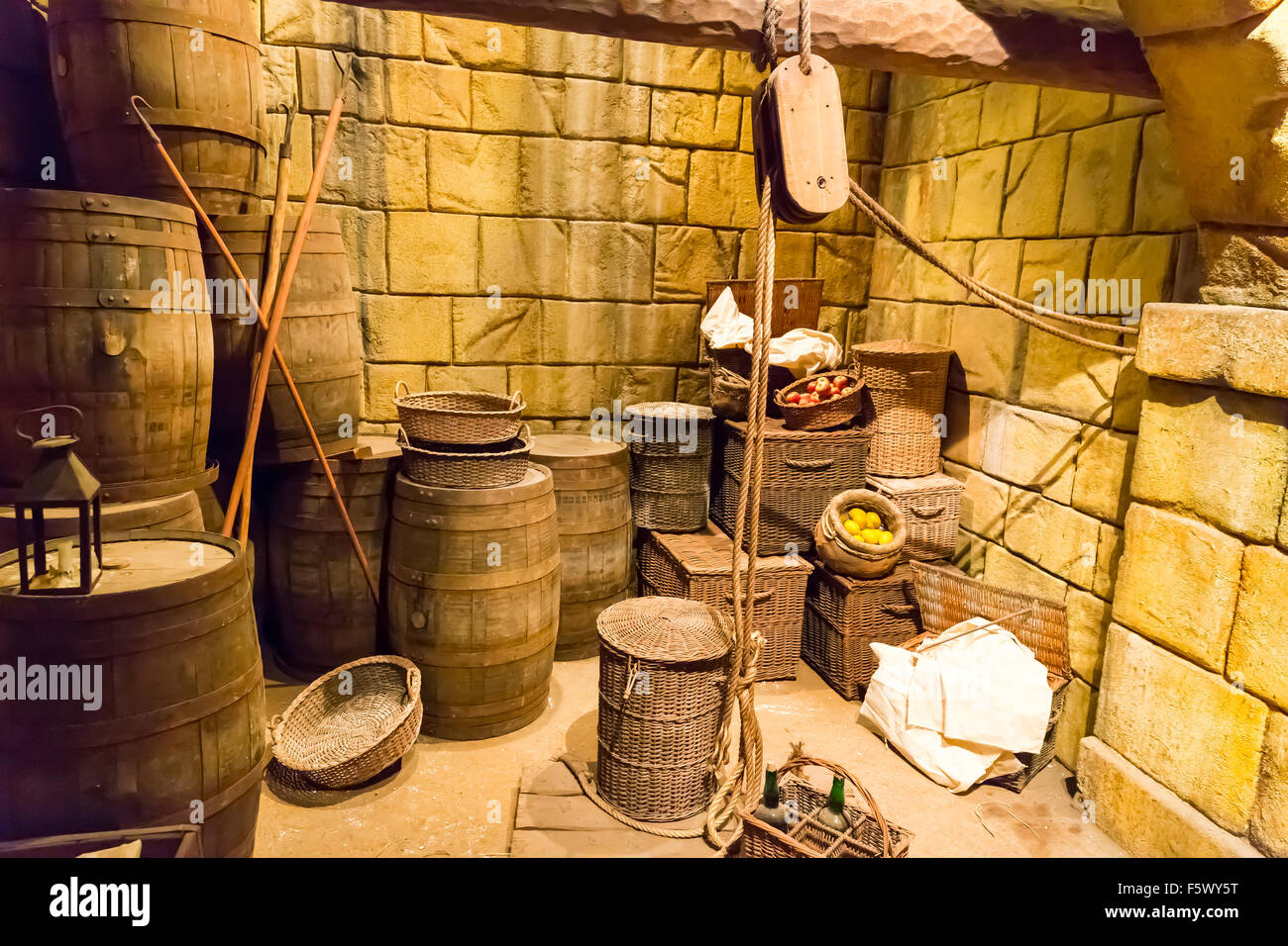 Lumber-room with wooden baskets and barrels Stock Photo - Alamy