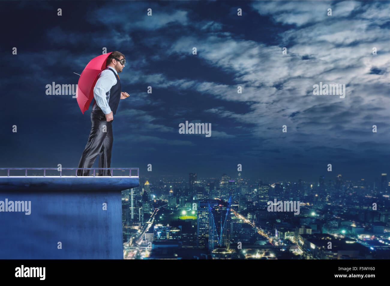 Businessman stands on top skyscraper hi-res stock photography and ...
