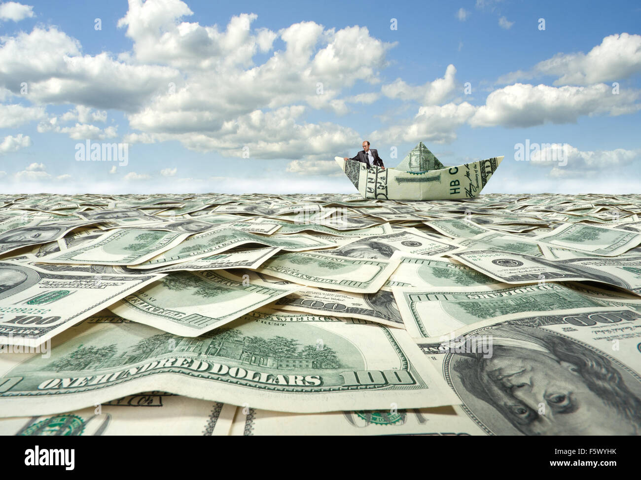 Successful businessman sailing on dollar boat in financial sea Stock ...