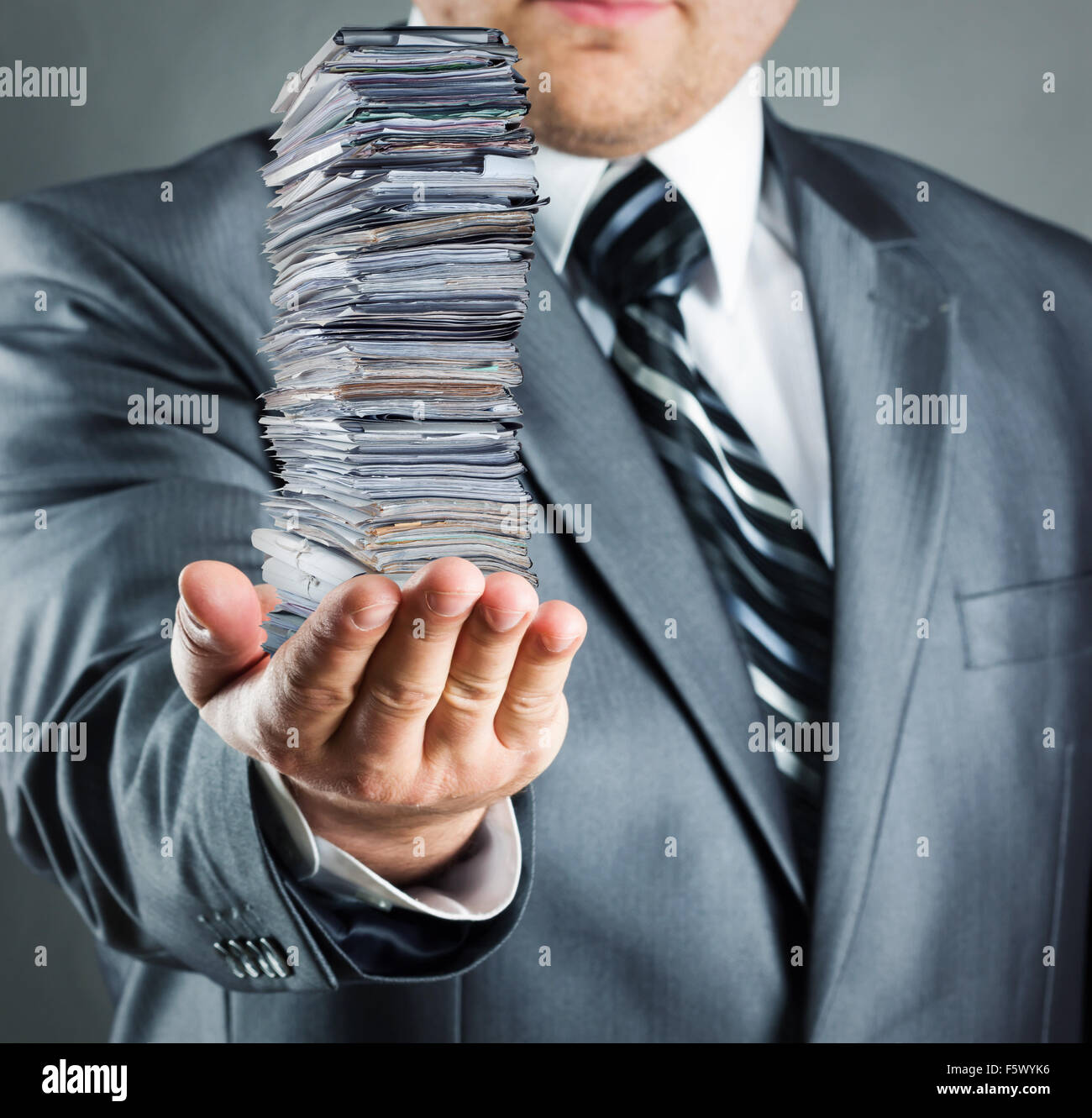 Businessman holding documents gesturing hi-res stock photography and ...