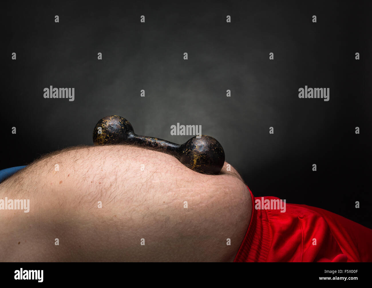 Overweight man dumbbell on hi-res stock photography and images - Alamy