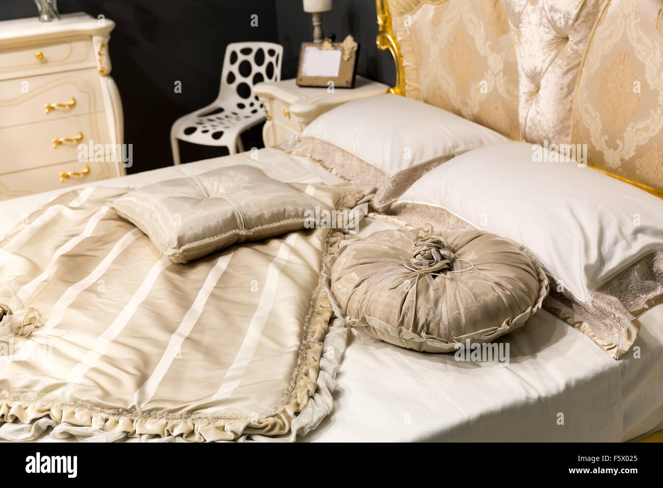 Classical bedroom interior with pillows Stock Photo - Alamy