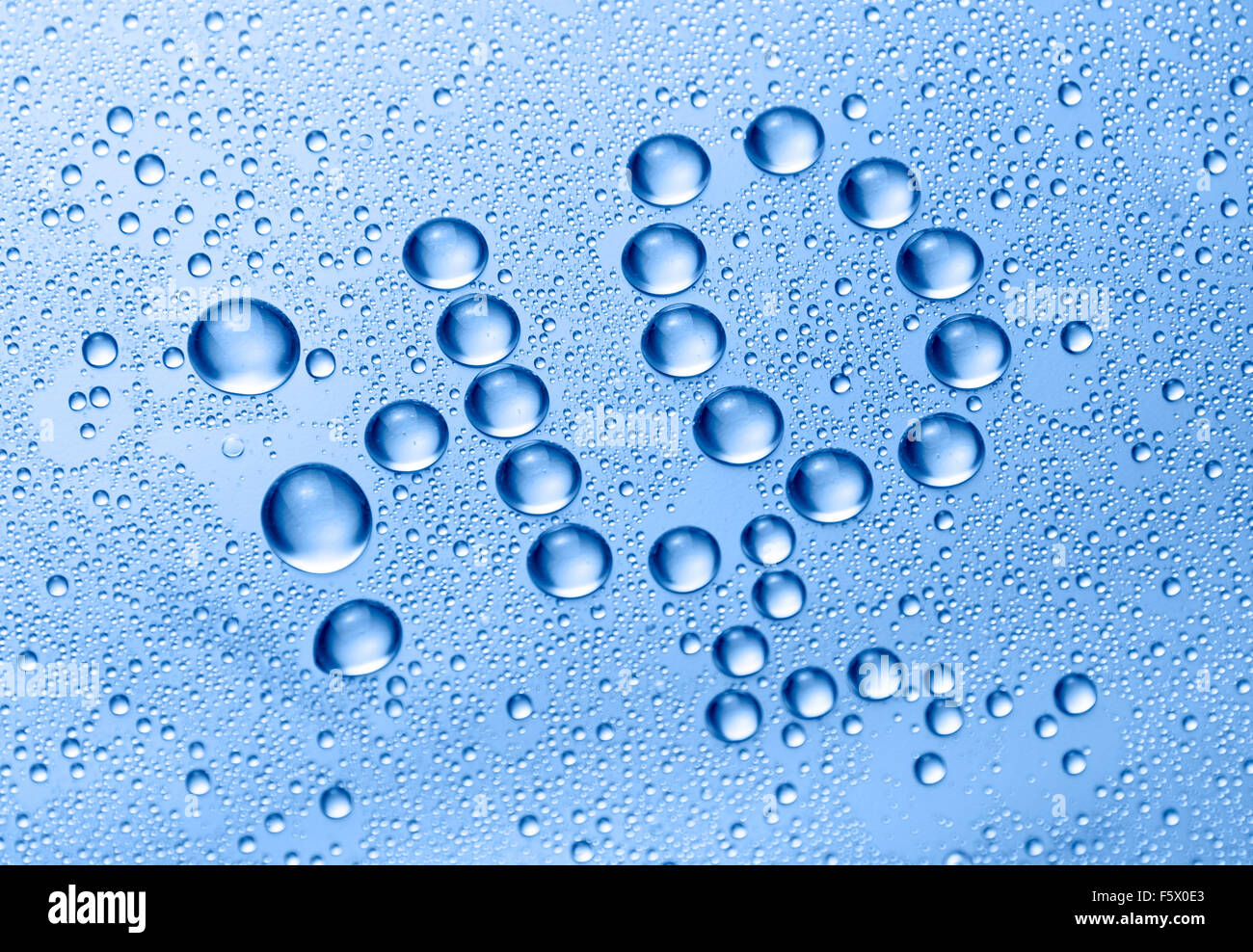 H2O. Water drops. Toned in blue Stock Photo - Alamy