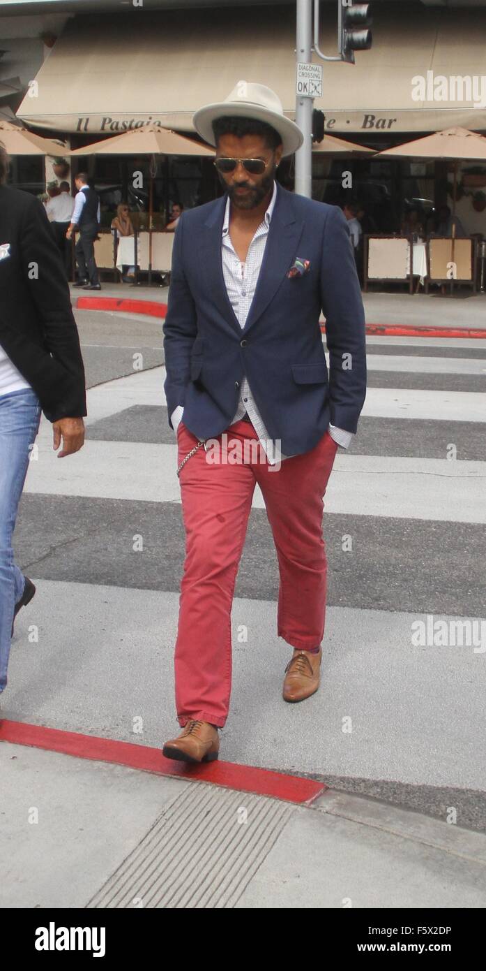 R&B singer Eric Benet and Mohamed Hadid go for a walk with the dog in ...