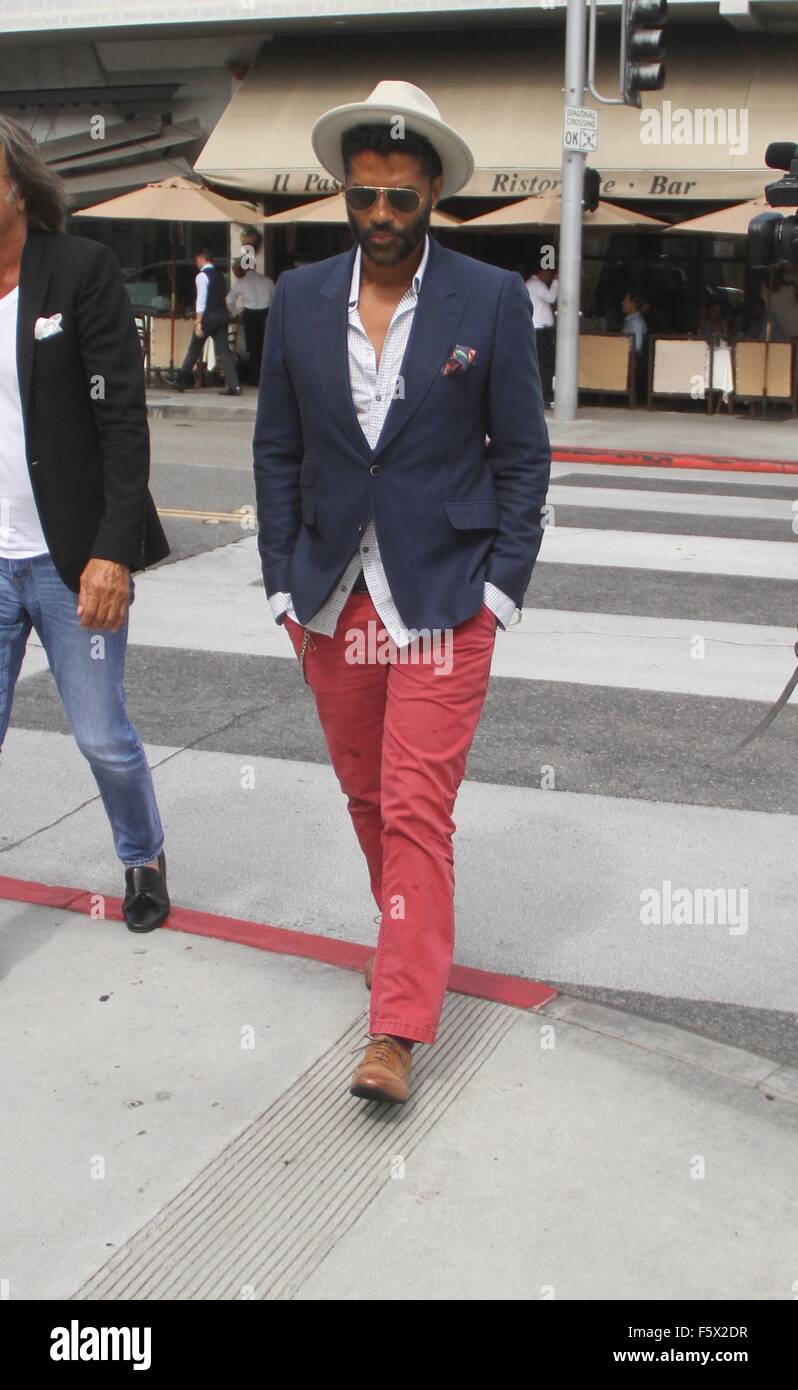 R&B singer Eric Benet and Mohamed Hadid go for a walk with the dog in ...