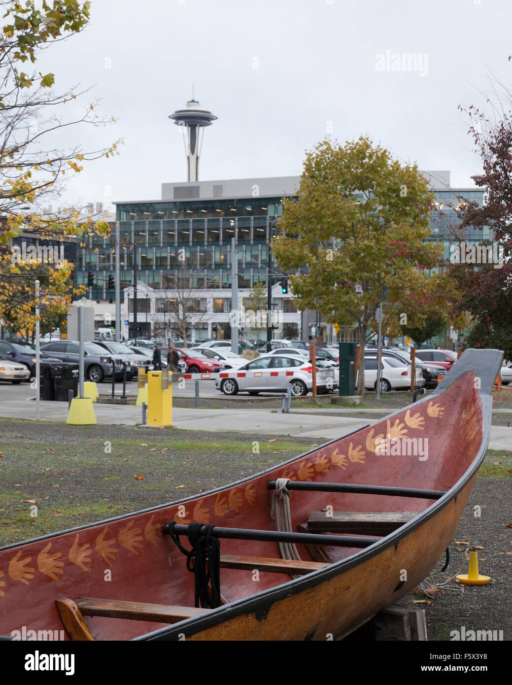 Native American canoe with the Seattle Space Needle in the background ...