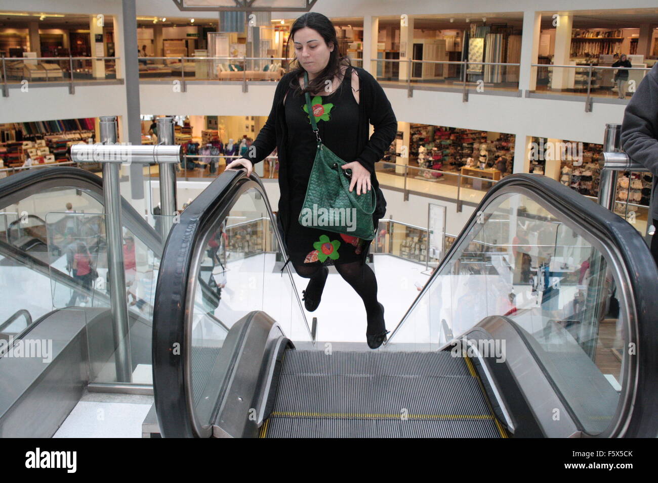 Greek woman floating above the escalator in John Lewis in Kingston-upon ...