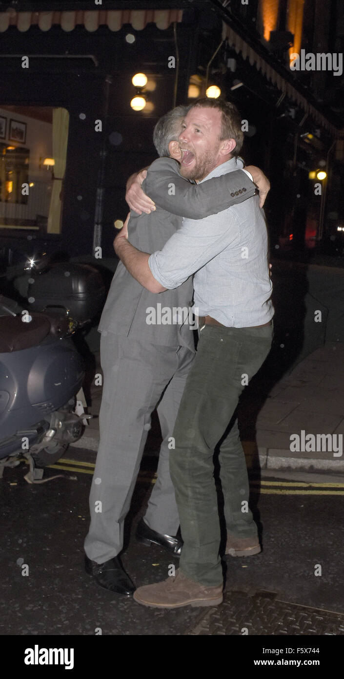 Guy Ritchie in a playful mood, hugging a friend when leaving Chiltern ...