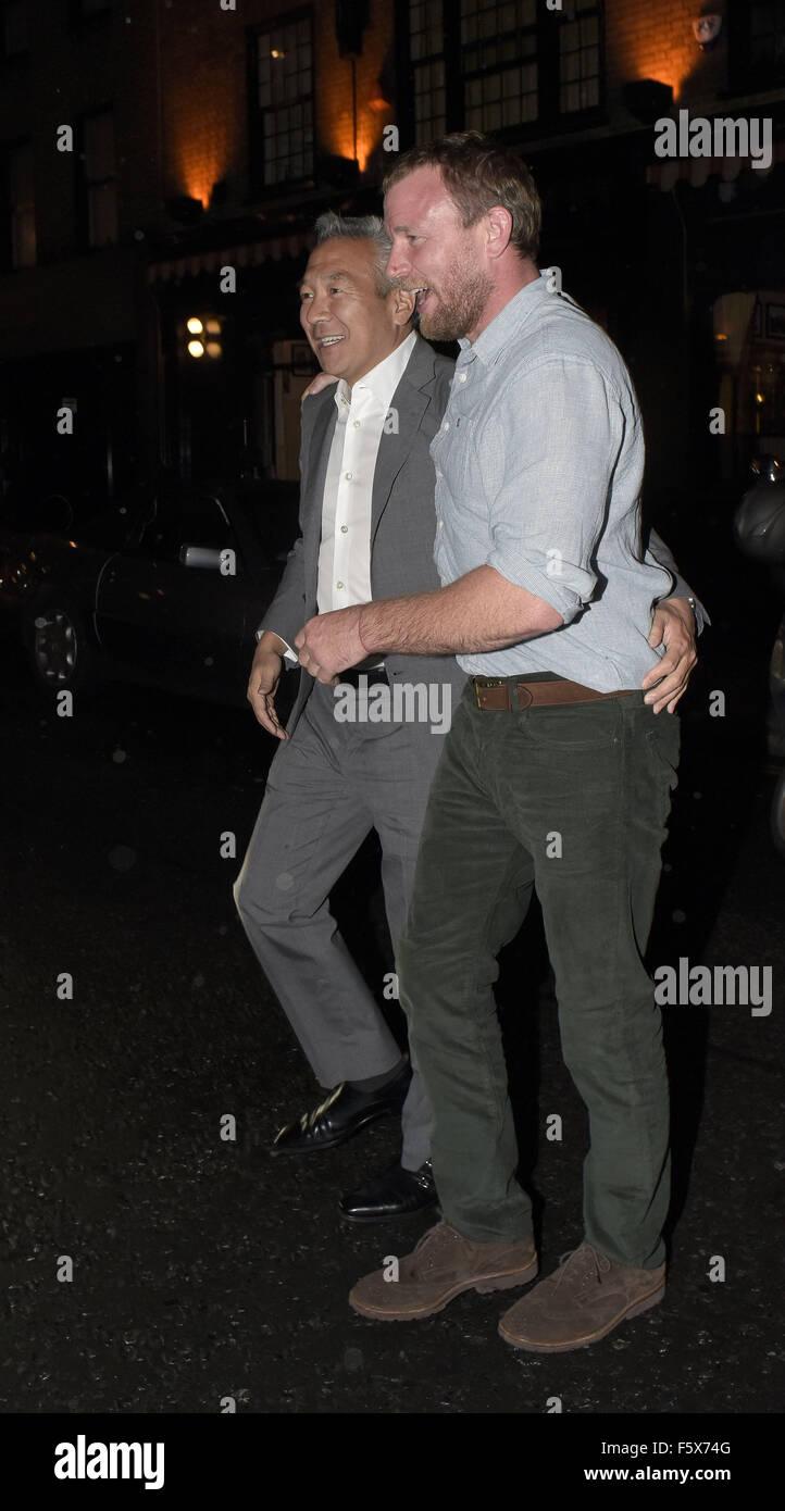 Guy Ritchie in a playful mood, hugging a friend when leaving Chiltern ...