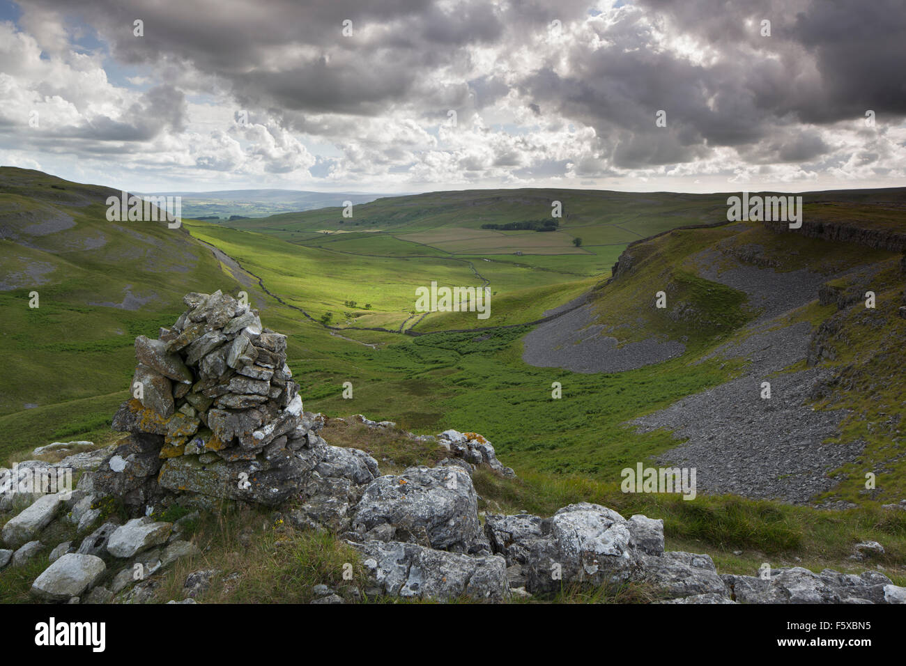 View down Crummackdale from the summit cairn at Moughton Scar Limestone ...