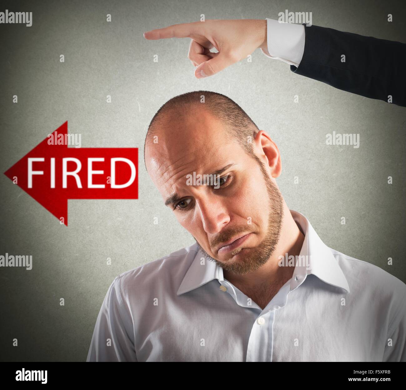 Sad fired businessman Stock Photo - Alamy